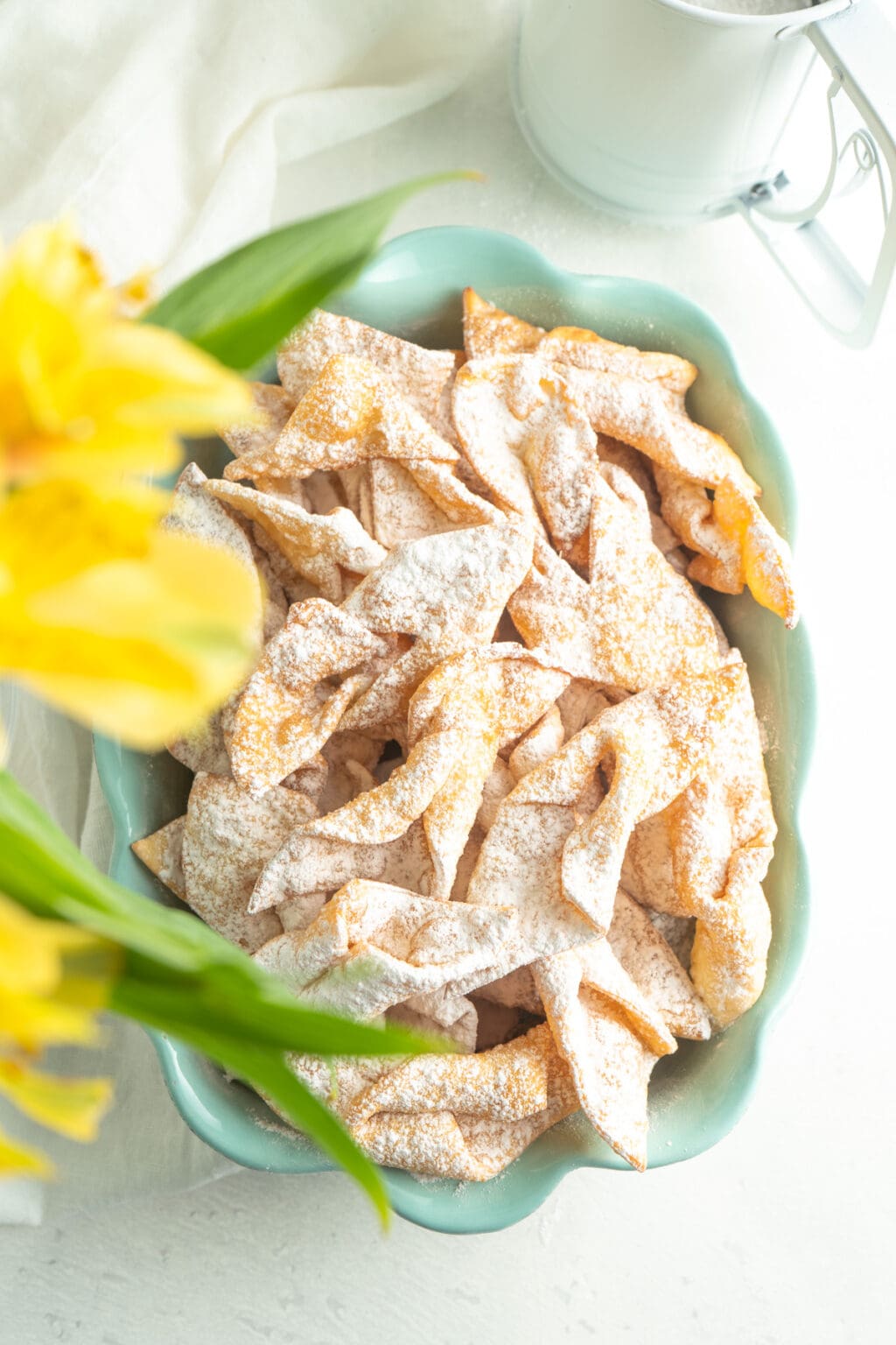 Chrusciki - light and airy fried pastries dusted in powdered sugar