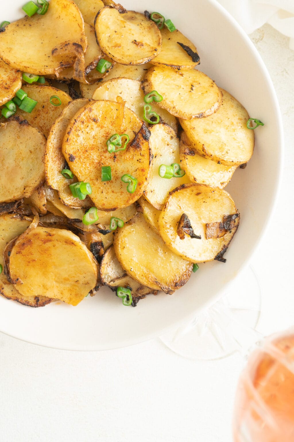 Quick & Easy Pan Fried Potatoes and Onions - The Delicious Spoon